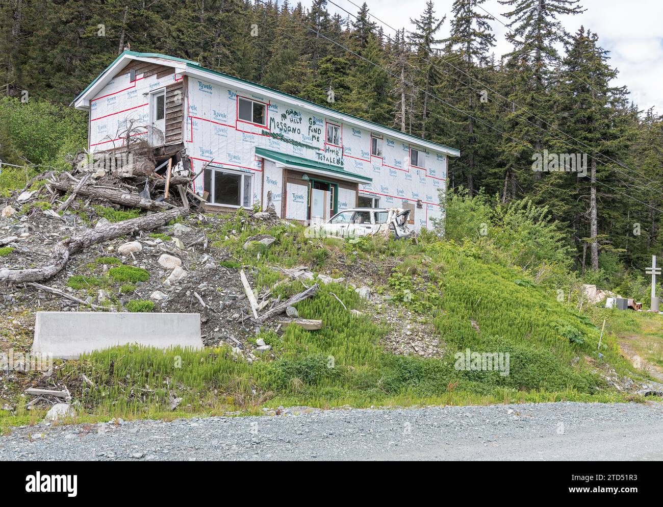 Landslip damaged house on Beach Road, Haines, Alaska, USA Stock Photo ...