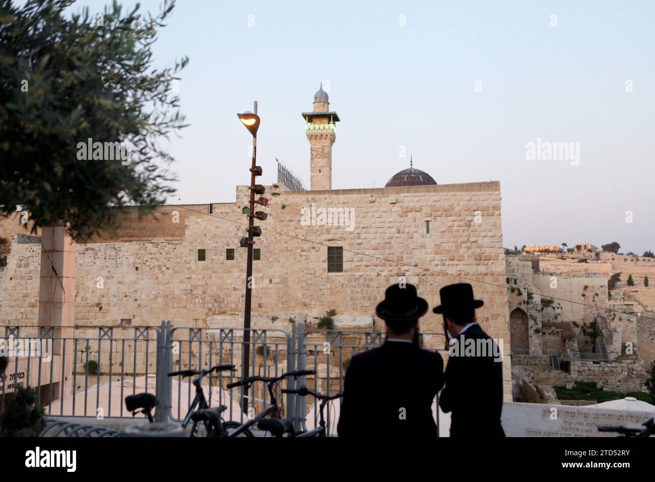 Western Wall and Worshipers in Jerusalem. The wall is one of the ...