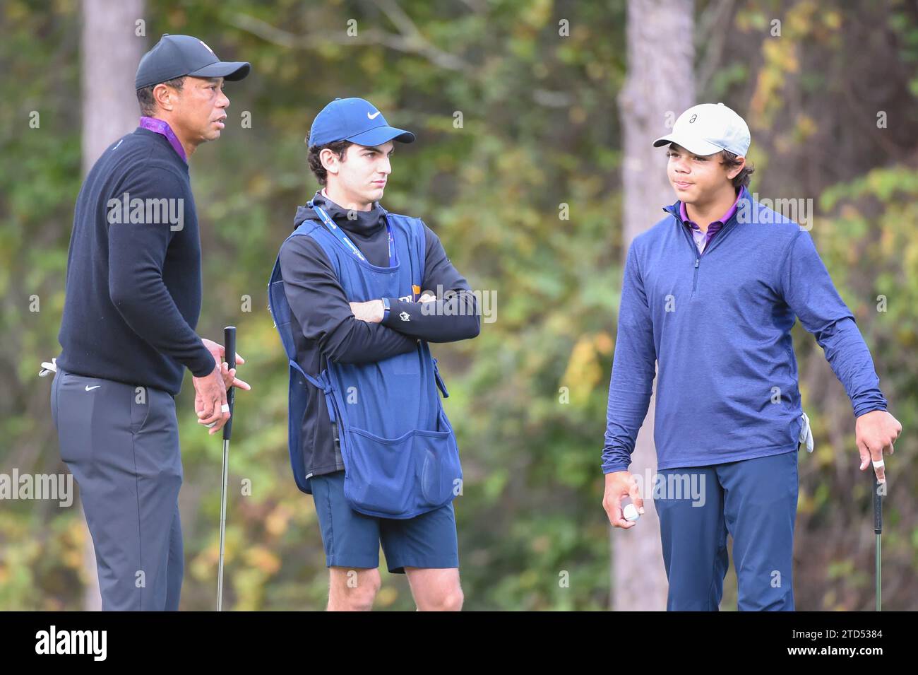 ORLANDO, FL - Tiger and Charlie Woods watch their shots during the pro ...