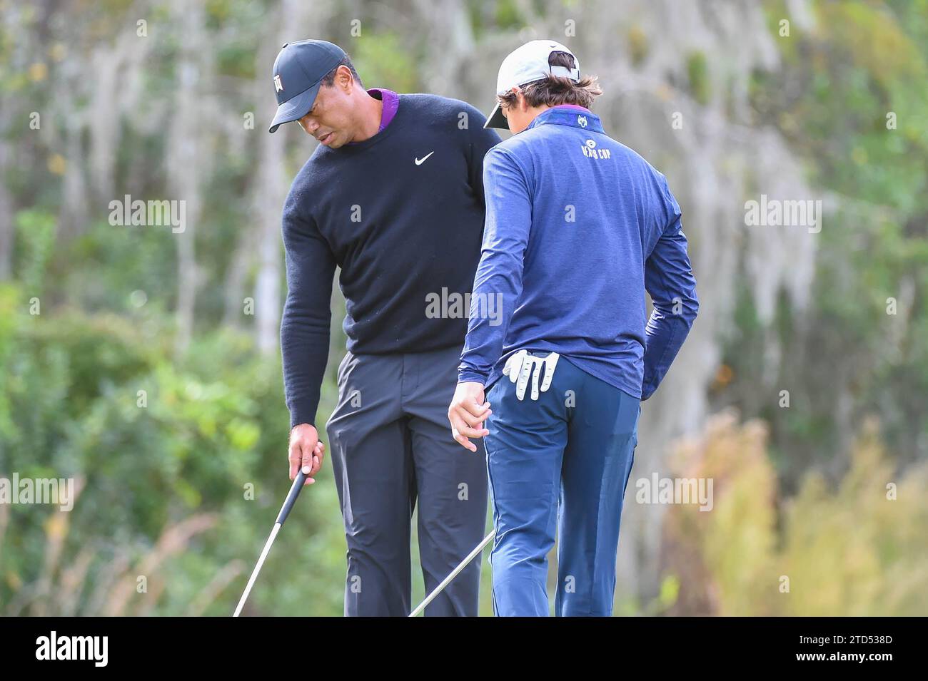 ORLANDO, FL - Tiger and Charlie Woods talk during the pro-am round of ...