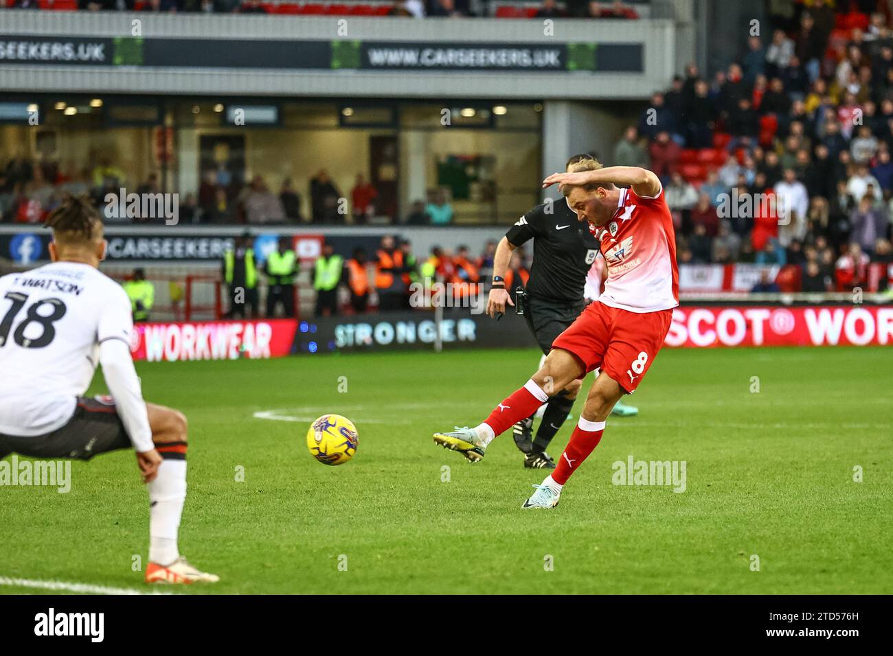 Herbie Kane #8 of Barnsley’s shot on goal is tipped over the bar by ...
