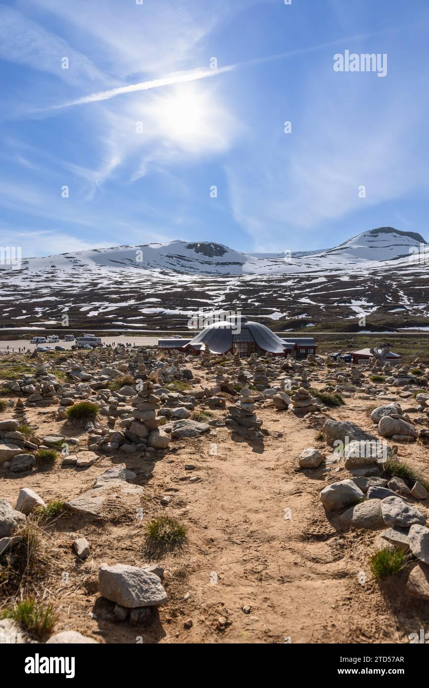 A vertical summer snapshot capturing the Arctic Circle Center and hand ...
