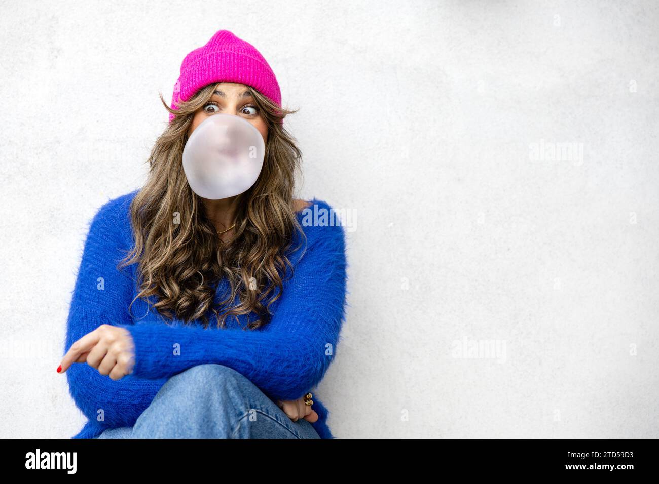 Portrait of beautiful girl with hat and surprised expression making ...