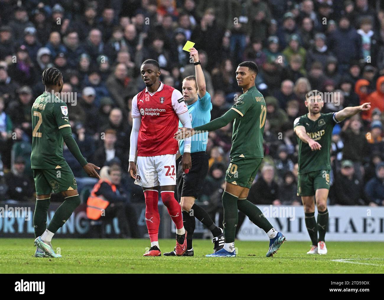 Hakeem Odoffin #22 of Rotherham United receives a yellow card during ...