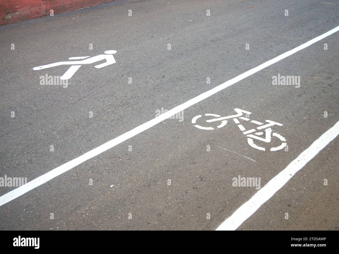 The cycle path and the pedestrian zone are marked with pictograms Stock ...