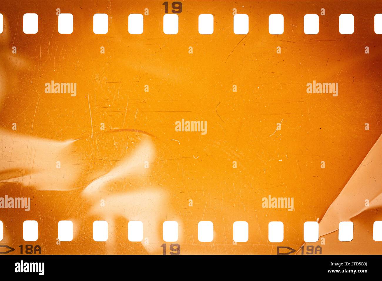 Dusty and grungy 35mm film texture or surface. Perforated scratched ...