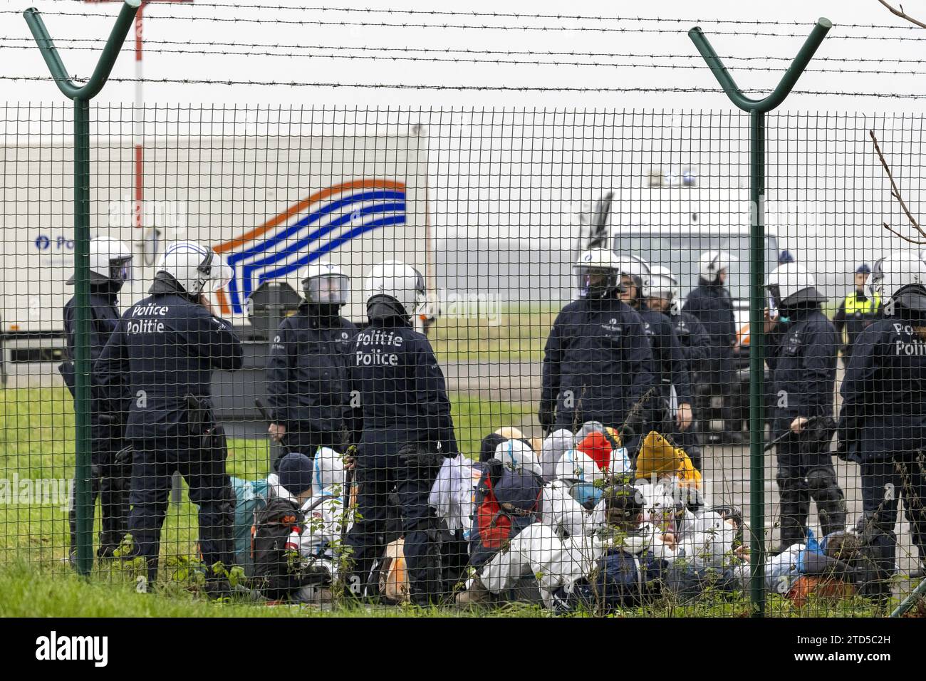 Police and protesters pictured during a mass action weekend, organized ...
