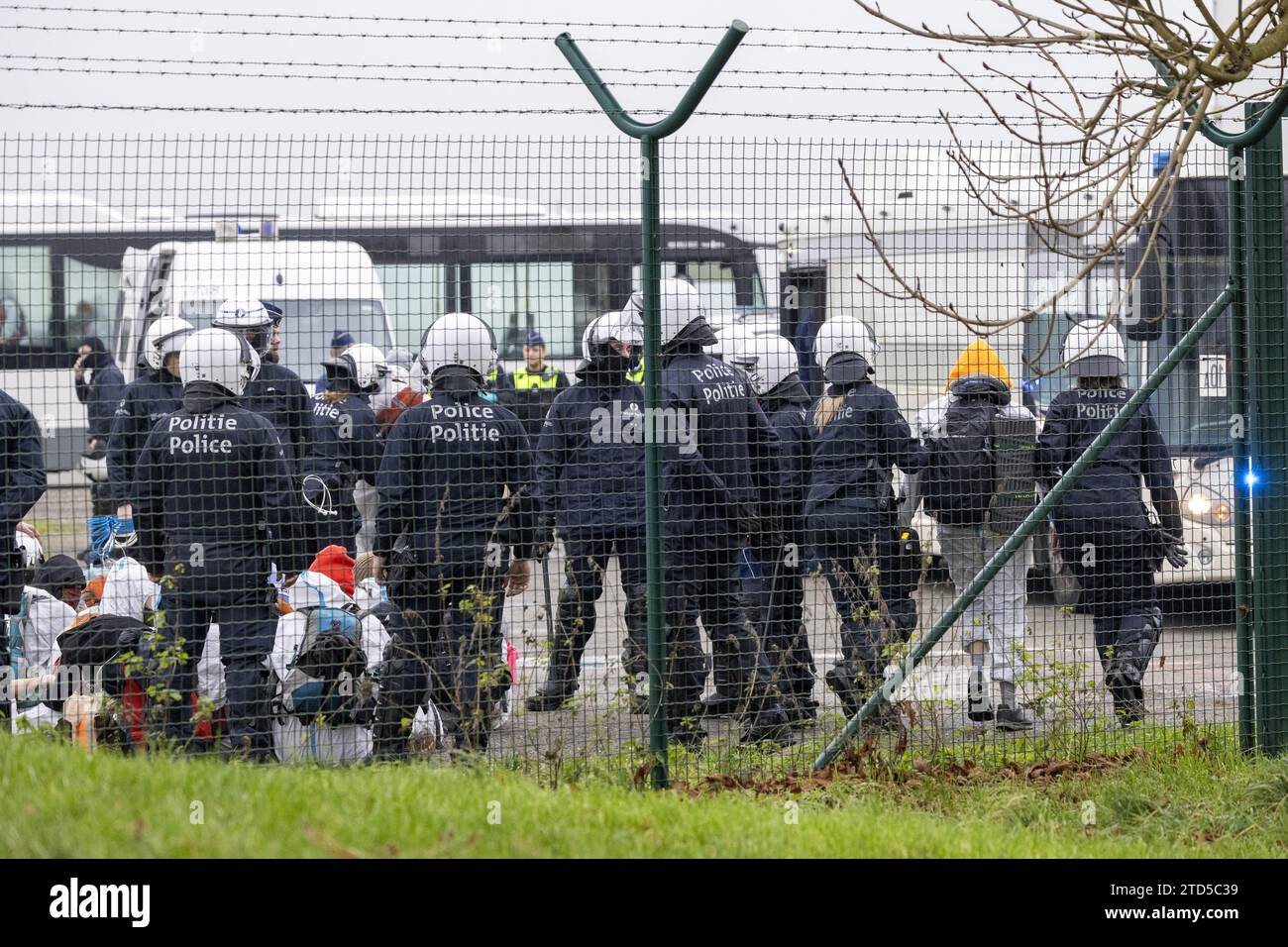 Police and protesters pictured during a mass action weekend, organized ...