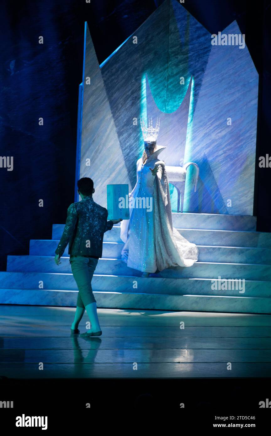 The wicked Snow Queen steps down from her throne with Kay during a ...