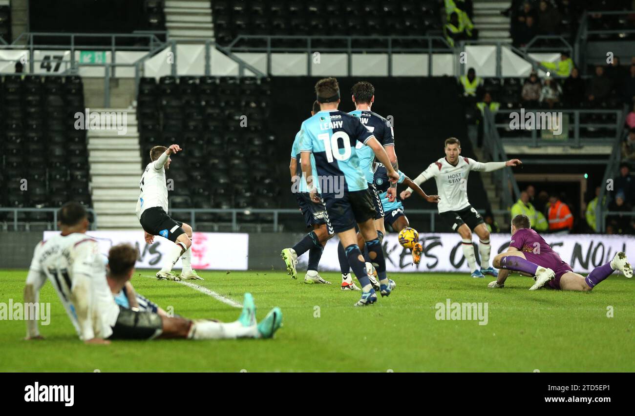 Derby County's Tom Barkhuizen scores their side's first goal of the ...