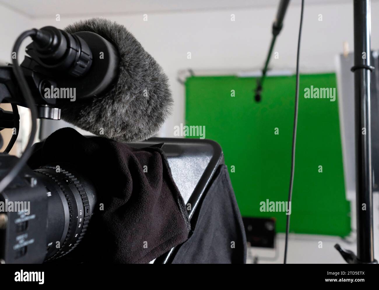 Setup in a TV studio with green screen, lights, and camera Stock Photo ...
