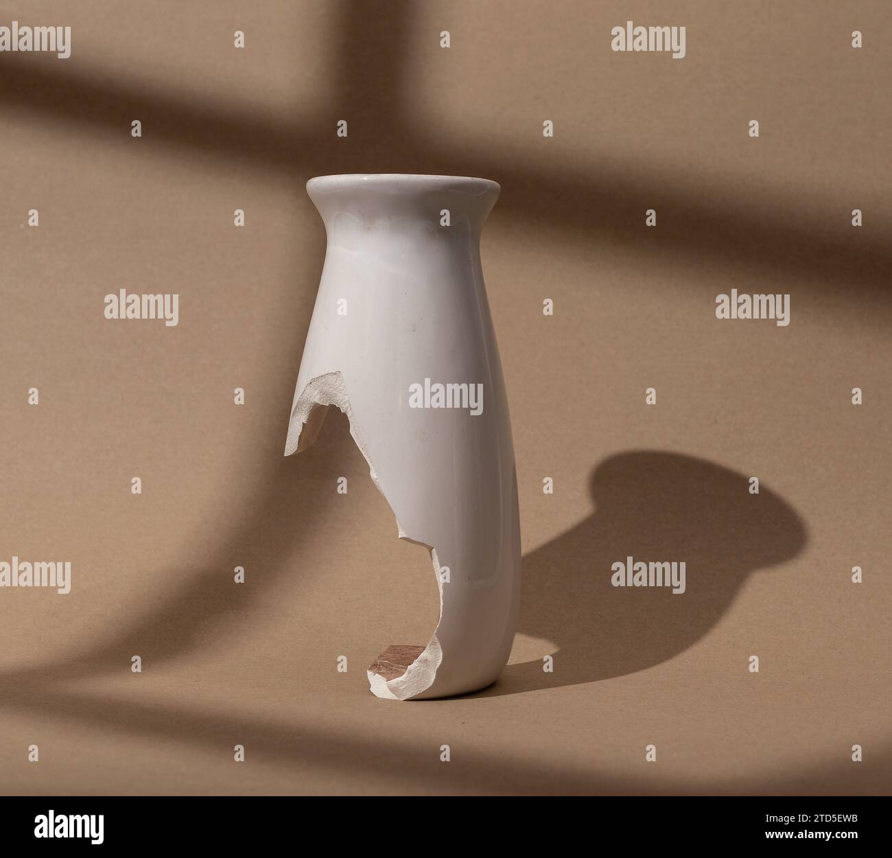 Broken shattered cracked vase, pottery Stock Photo - Alamy