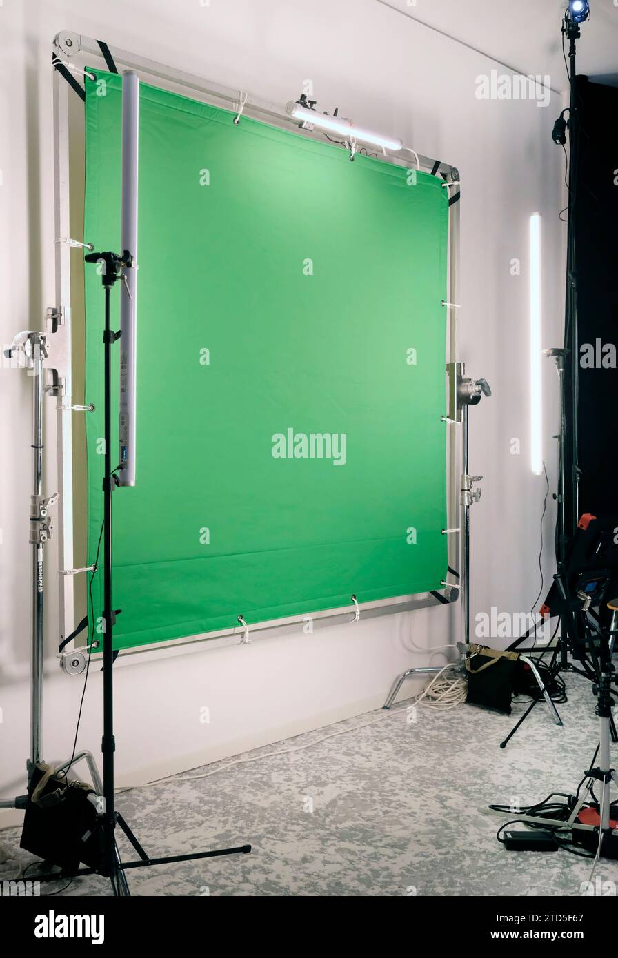 Setup in a TV studio with green screen, lights, and camera Stock Photo ...
