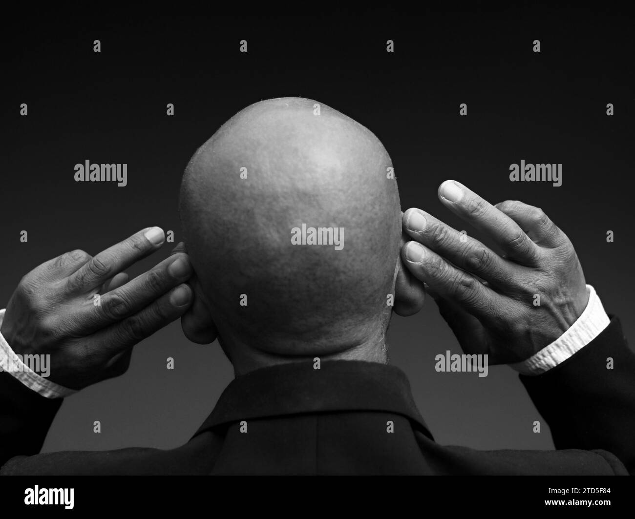 deafness suffering from hearing loss on grey black background with ...