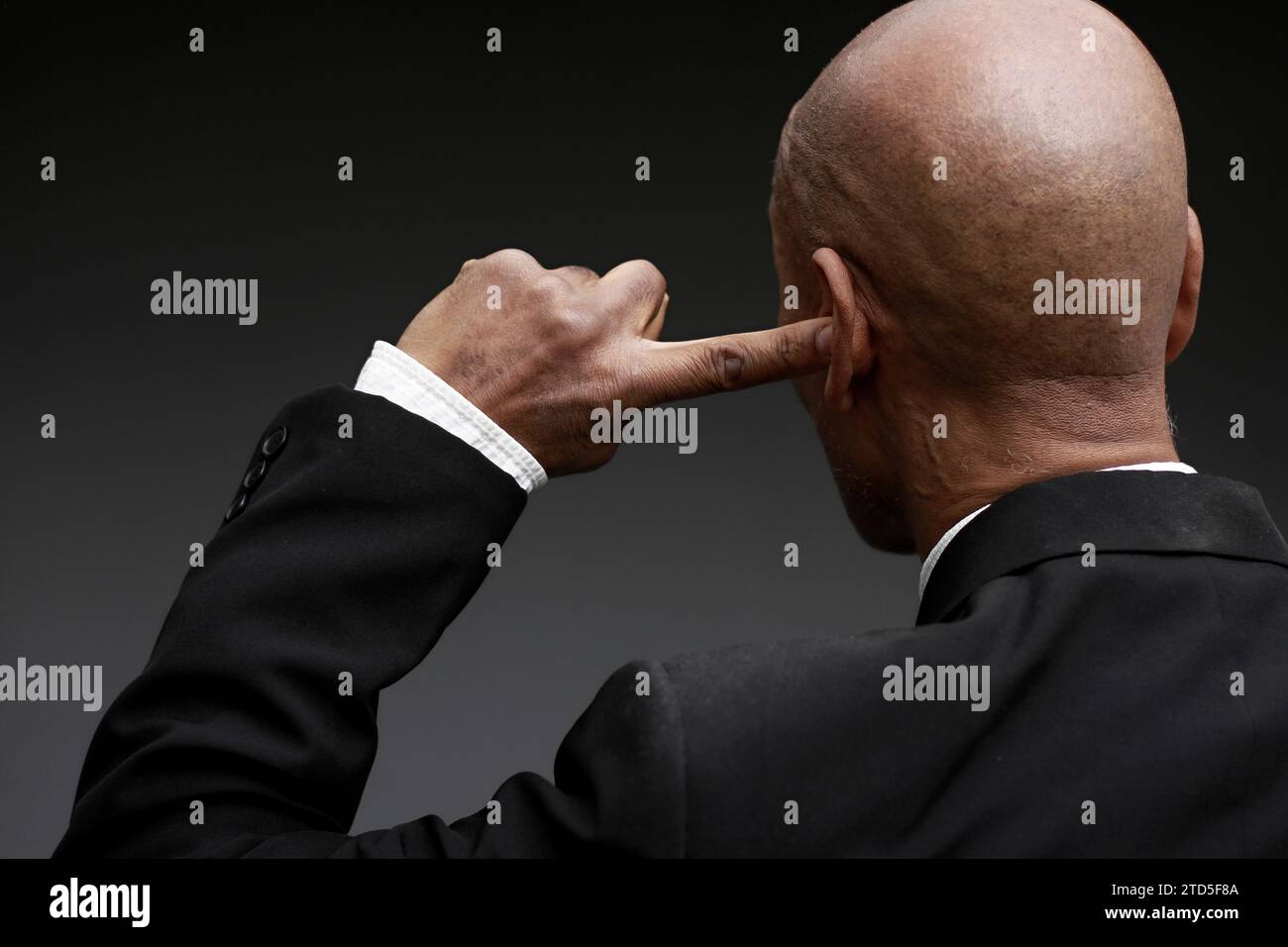 deafness suffering from hearing loss on grey black background with ...