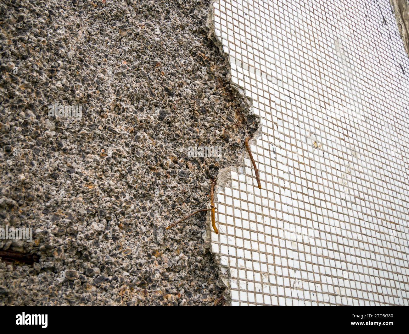 Chipped finishing tile of the facade of an old panel house Stock Photo ...