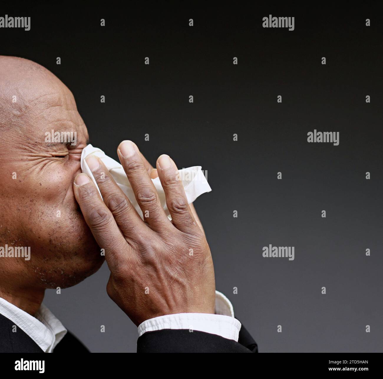 man catching the cold and flu man blowing nose after catching a cold ...