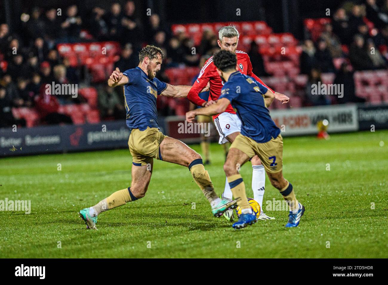 Salford, UK. 16th December 2023.Wimbledon's Huseyin Biler (2) and Joe ...