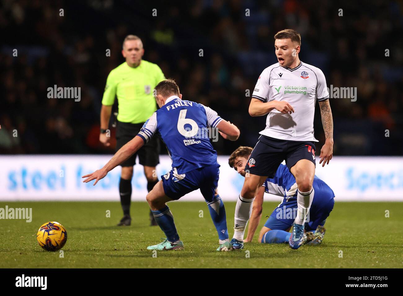 Bolton, UK. 16th December 2023.Boltons Aaron Morley beats Bristol’s Sam ...