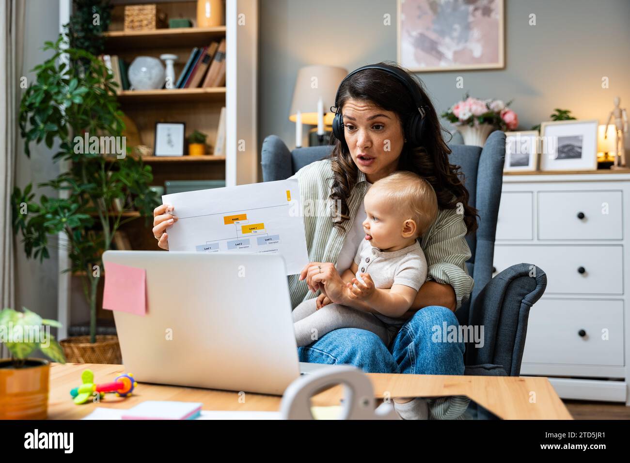 Business woman on maternity leave. Mother with newborn baby working ...