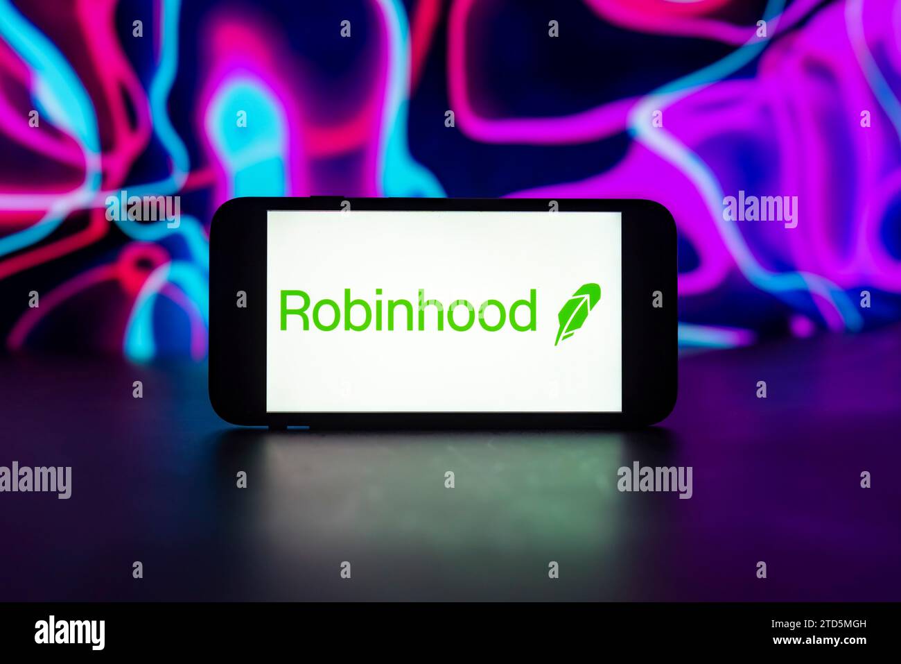 In this photo illustration, the Robinhood logo is seen displayed on a ...