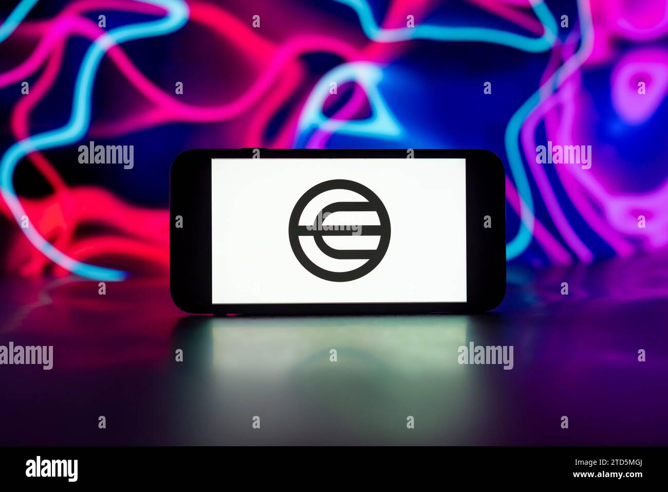 In this photo illustration, the Worldcoin logo is seen displayed on a ...