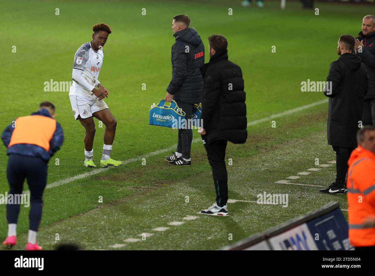 Swansea, Wales, UK. 16th Dec, 2023. Jamal Lowe of Swansea city does a ...