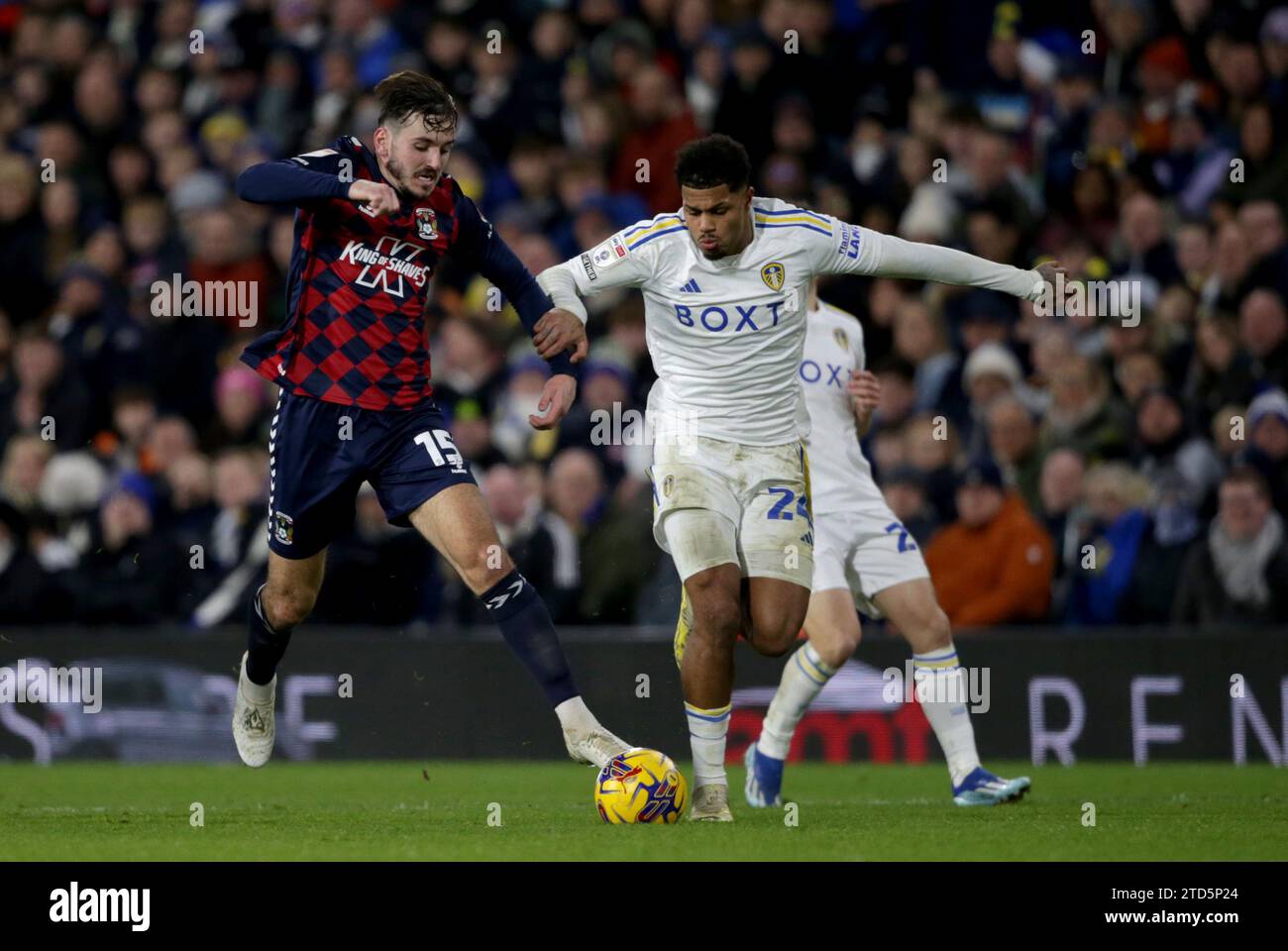 Coventry City's Liam Kitching (left) and Leeds United's Georginio ...