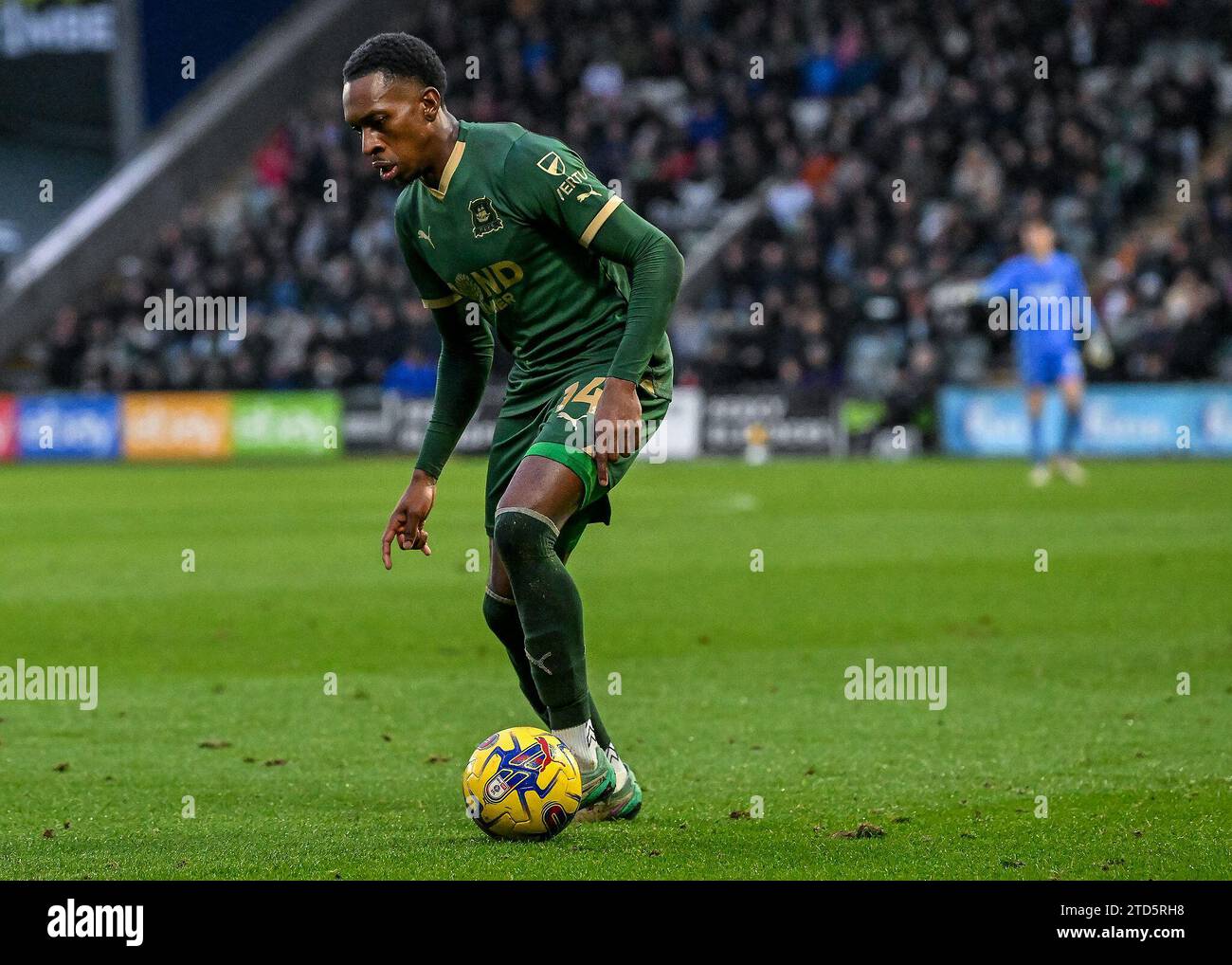 Mickel Miller #14 of Plymouth Argyle on the ball during the Sky Bet ...