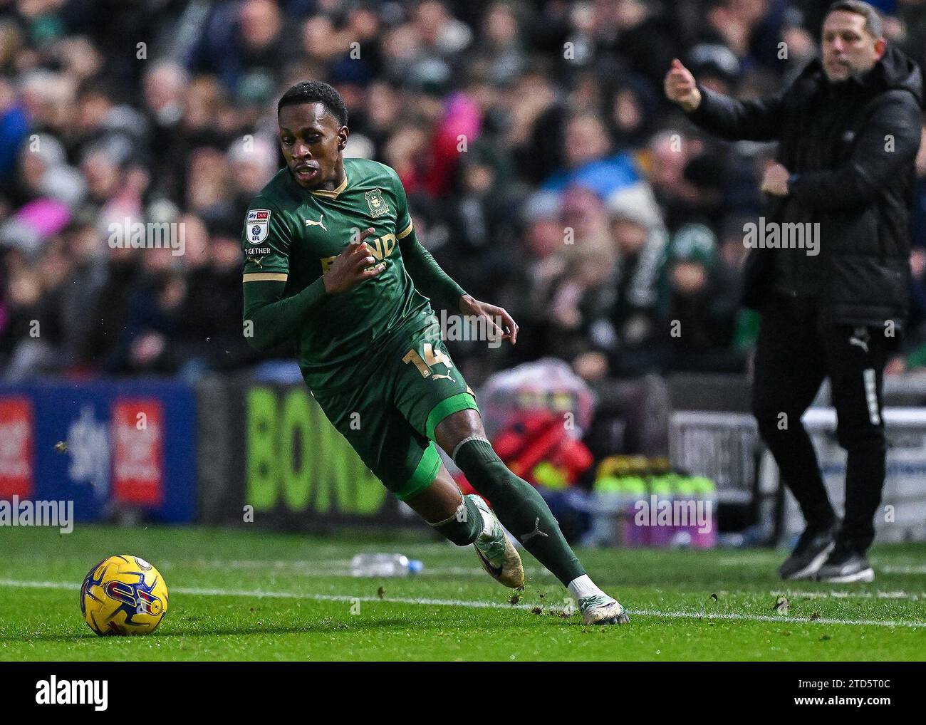 Mickel Miller #14 of Plymouth Argyle attacking during the Sky Bet ...
