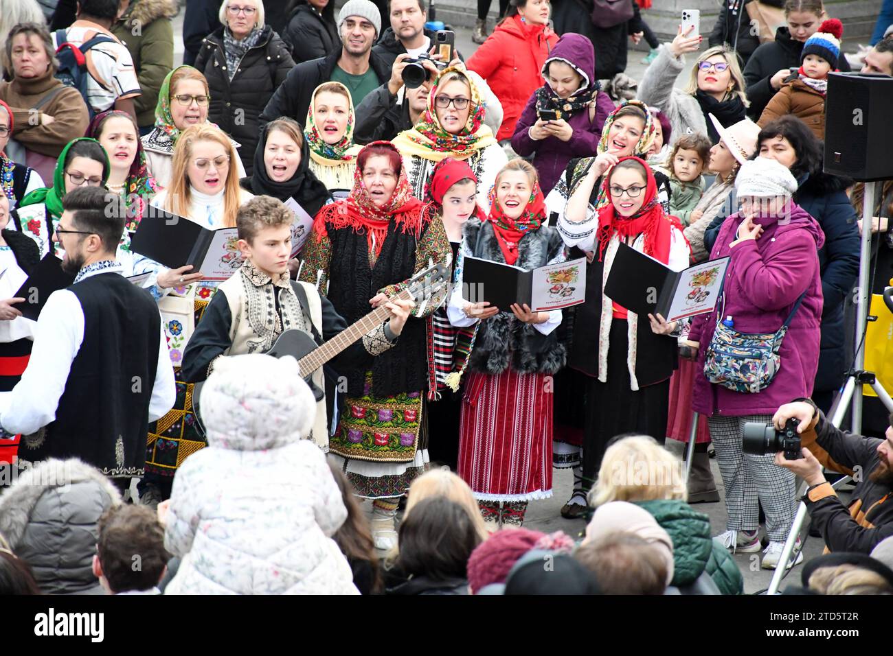 London, UK. 16th Dec, 2023. Romanian carol singers at the Christmas ...