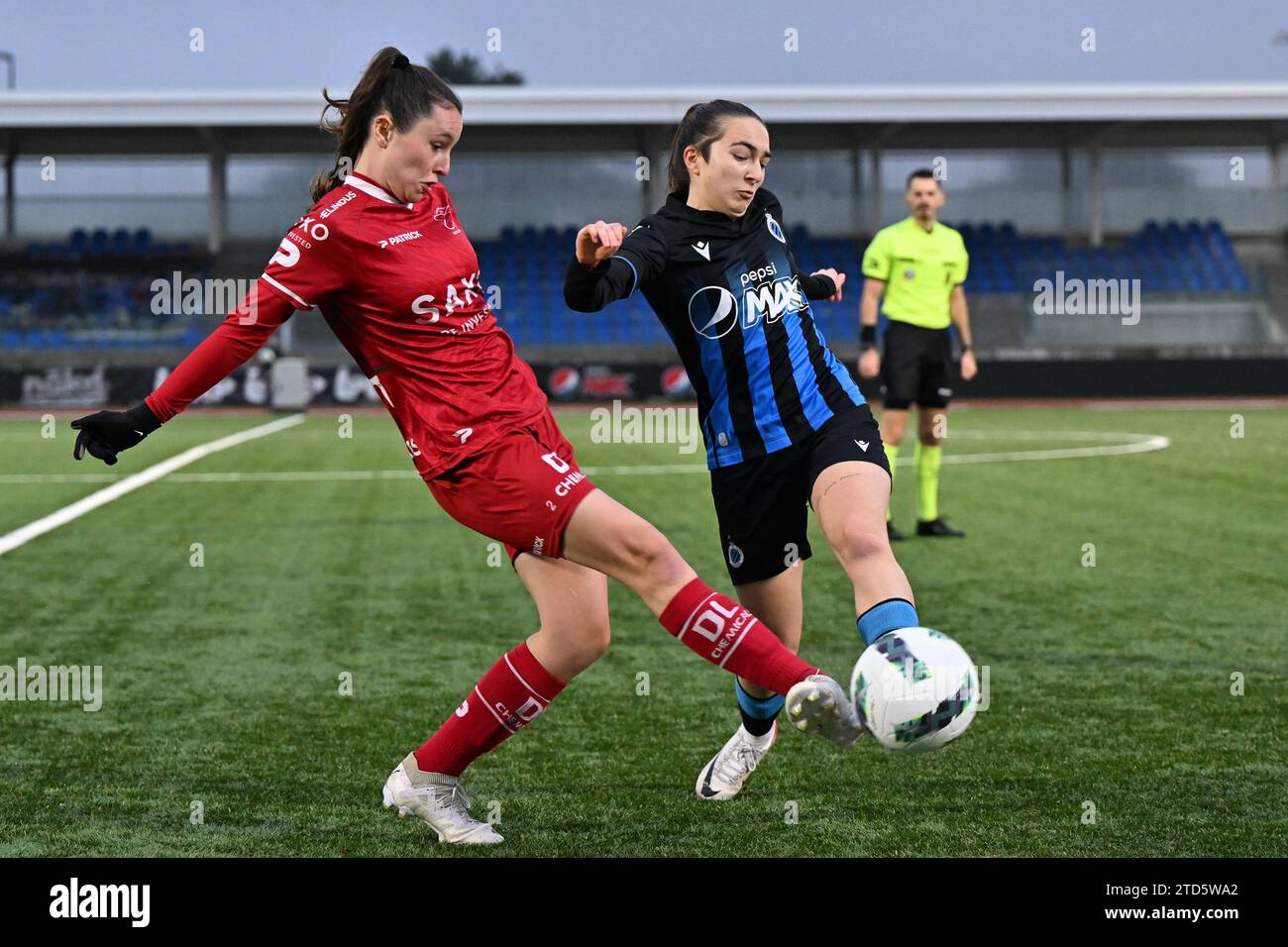 Heike Maelfait (2) of Zulte-Waregem pictured fighting for the ball with Angel Kerkhove (13) of ...