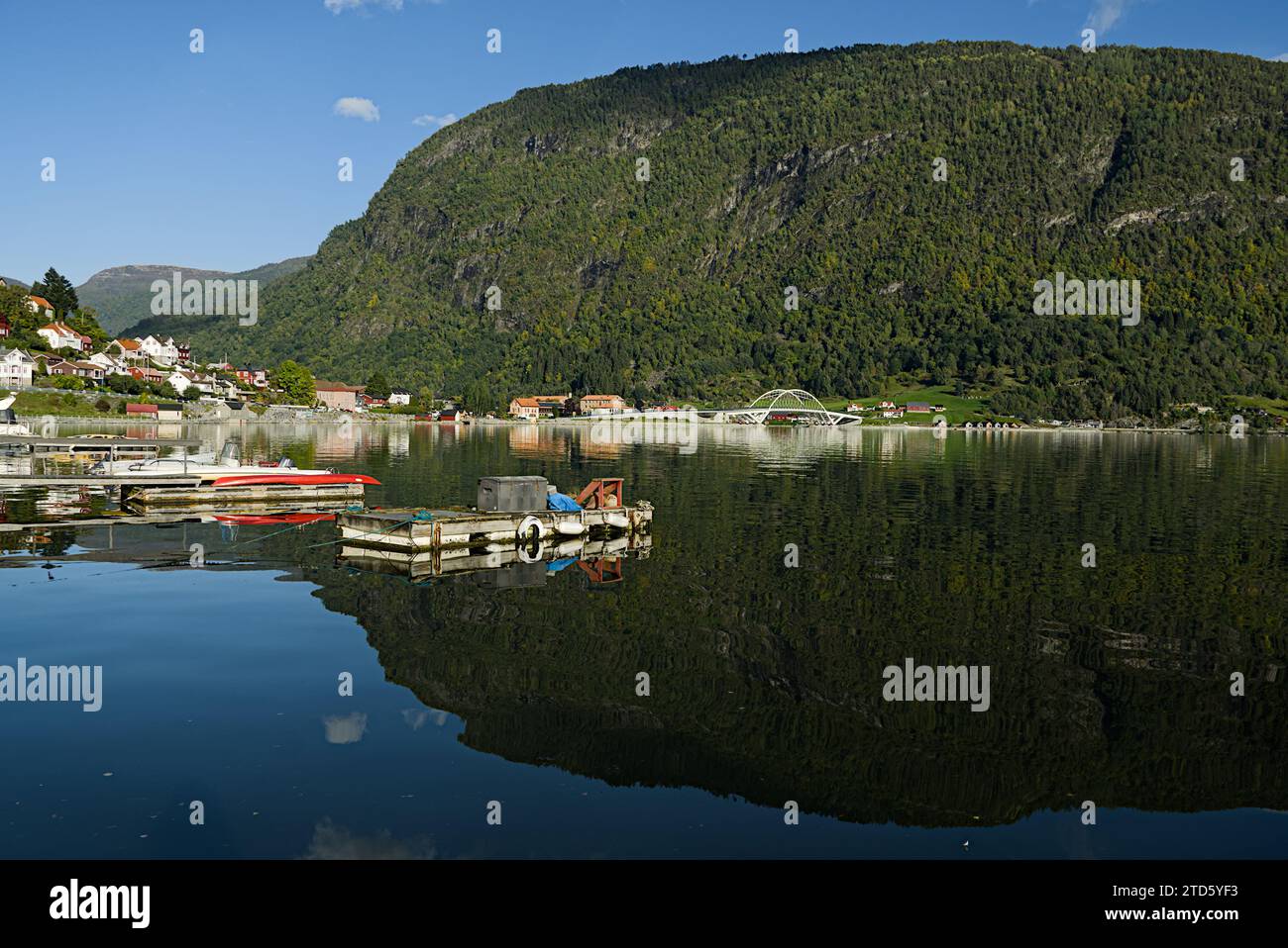 Colorful buildings along the hill side and their reflections on the ...