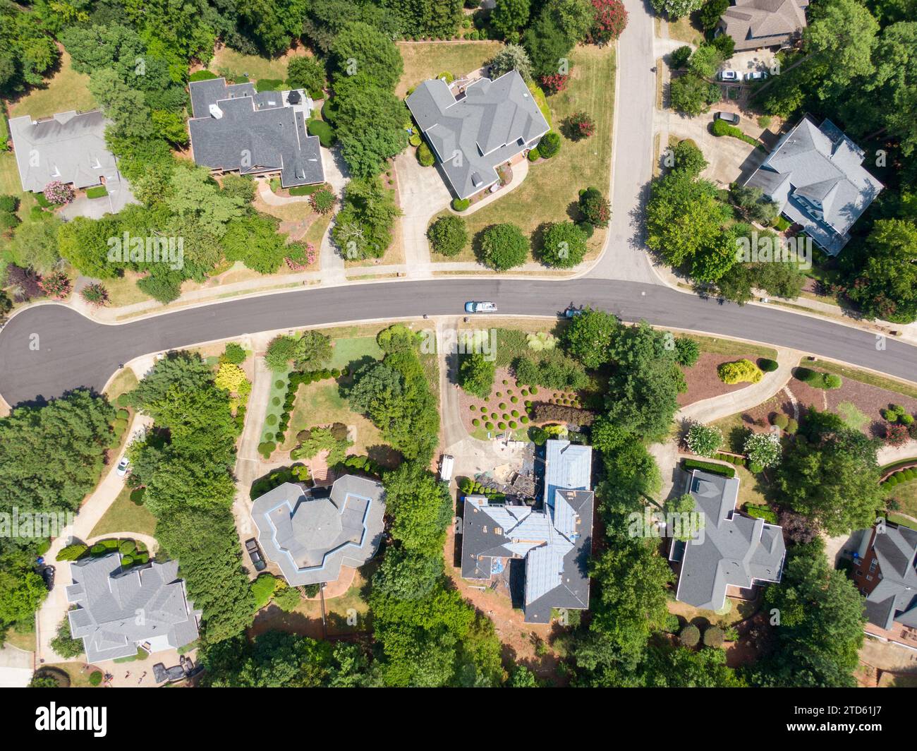 drone images of suburban single family home subdivisions in the united ...