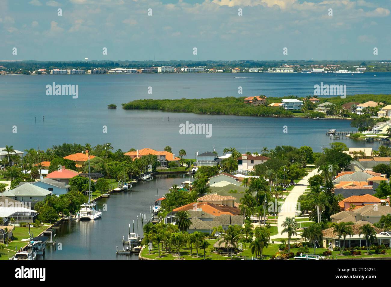 Aerial view of rural private houses in remote suburbs located on sea ...