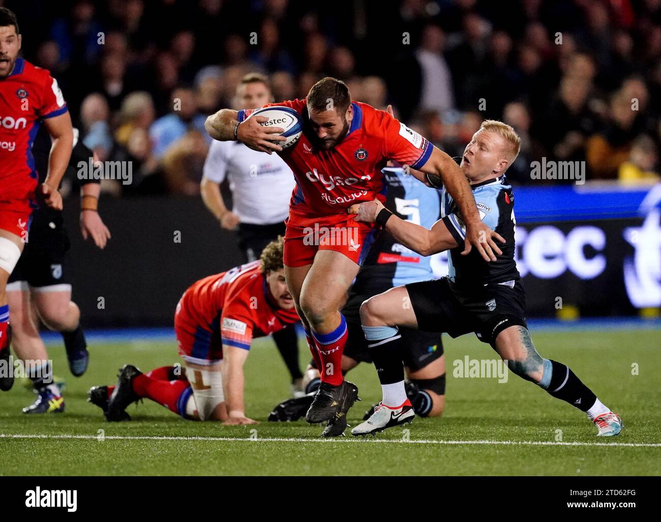 Bath Rugby's Thomas Du Toit is tackled by Cardiff Rugby's Tinus de Beer ...