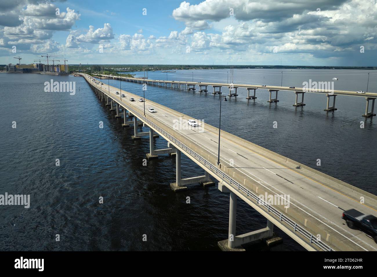 Barron Collier Bridge and Gilchrist Bridge in Florida with moving ...