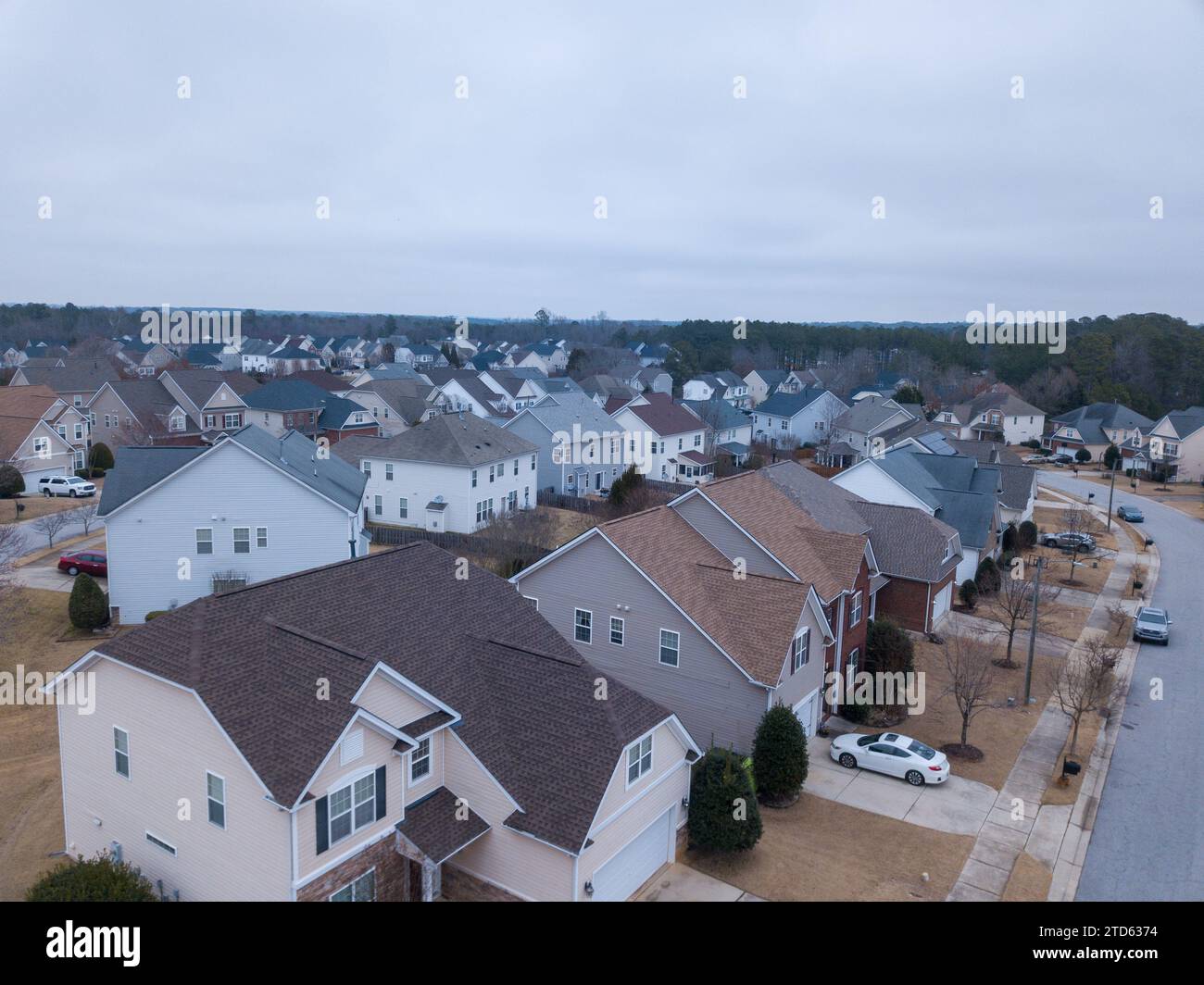 drone images of suburban single family home subdivisions in the united ...