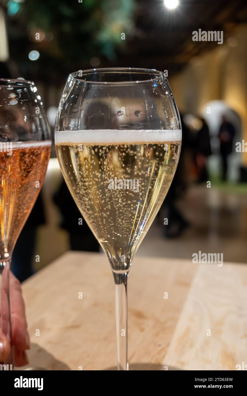 Glass with little bubbles, tasting of sparkling wine champagne on ...