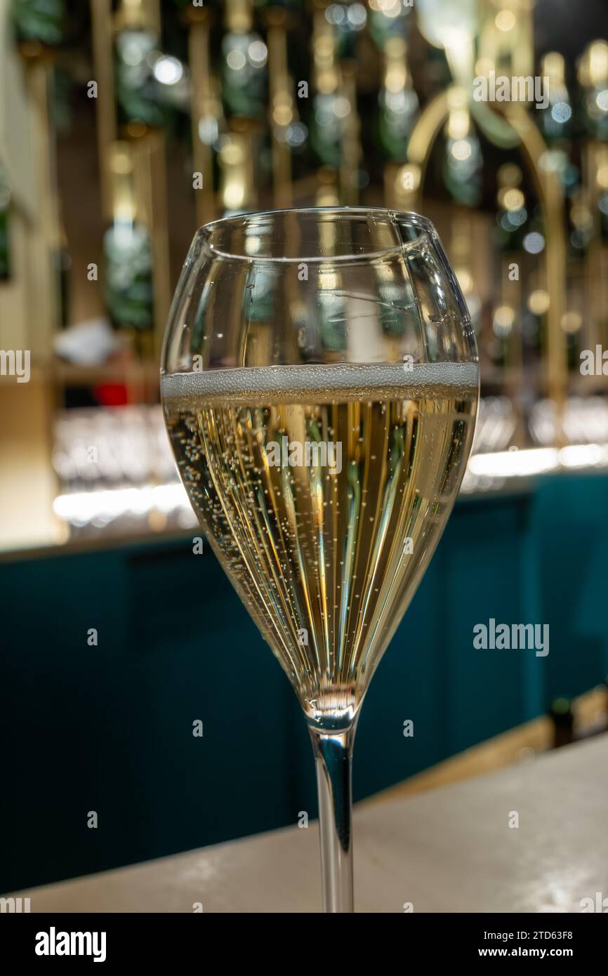 Glass with little bubbles, tasting of sparkling wine champagne on ...