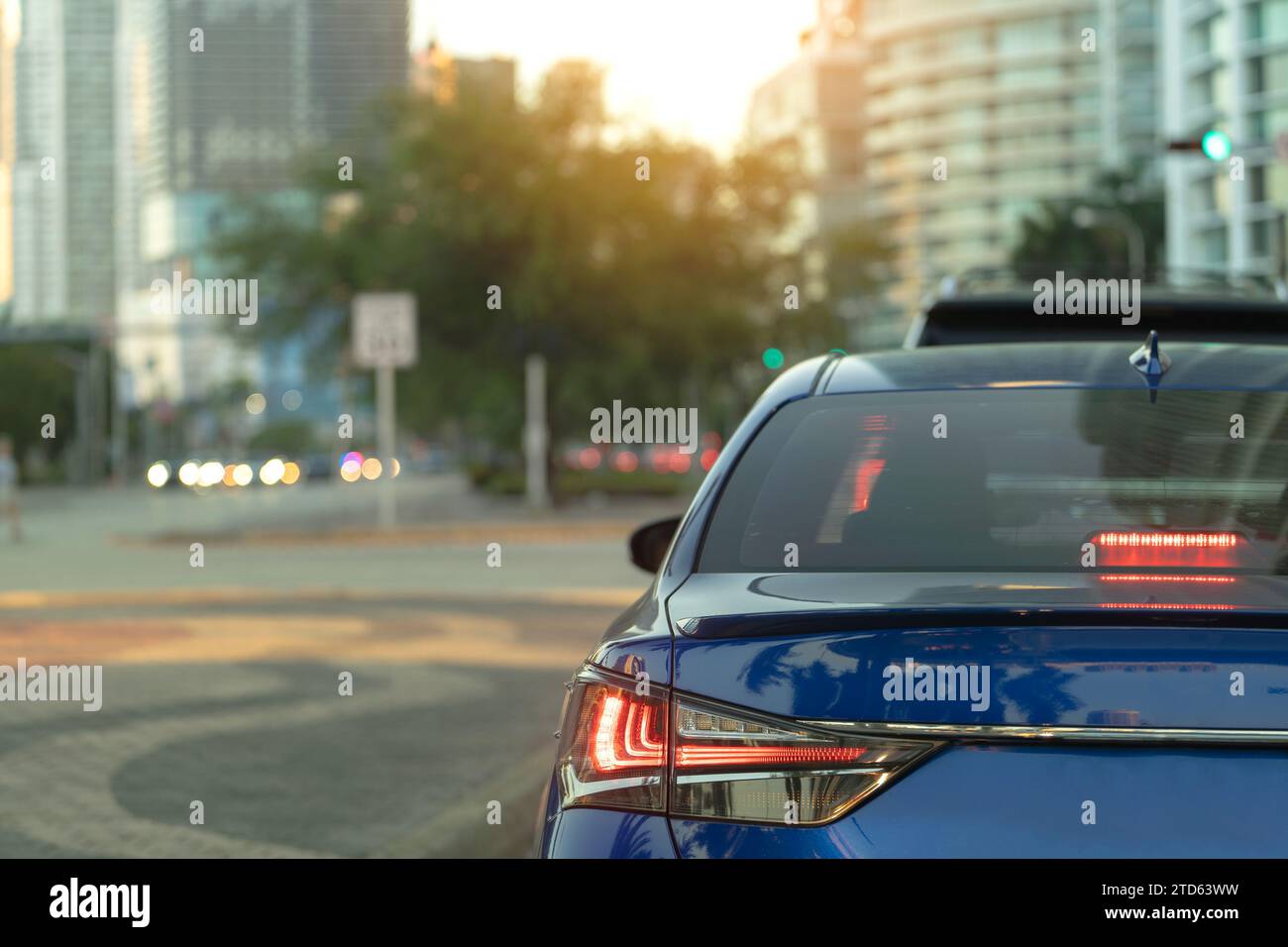 Miami street traffic with driving cars at urban intersection in Florida ...