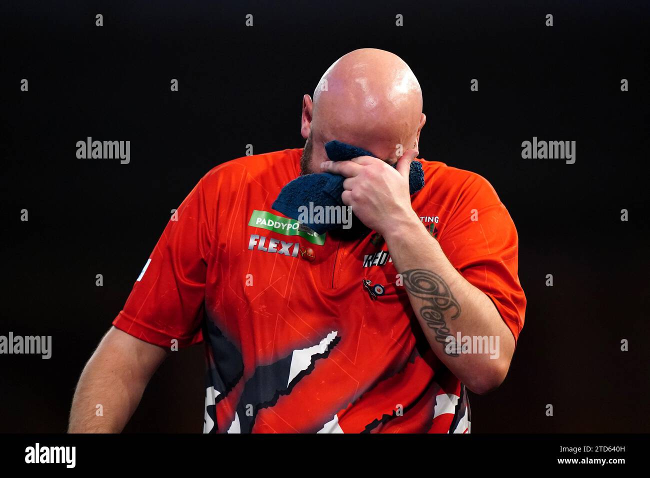 Jamie Hughes reacts after winning his match against David Cameron (not ...
