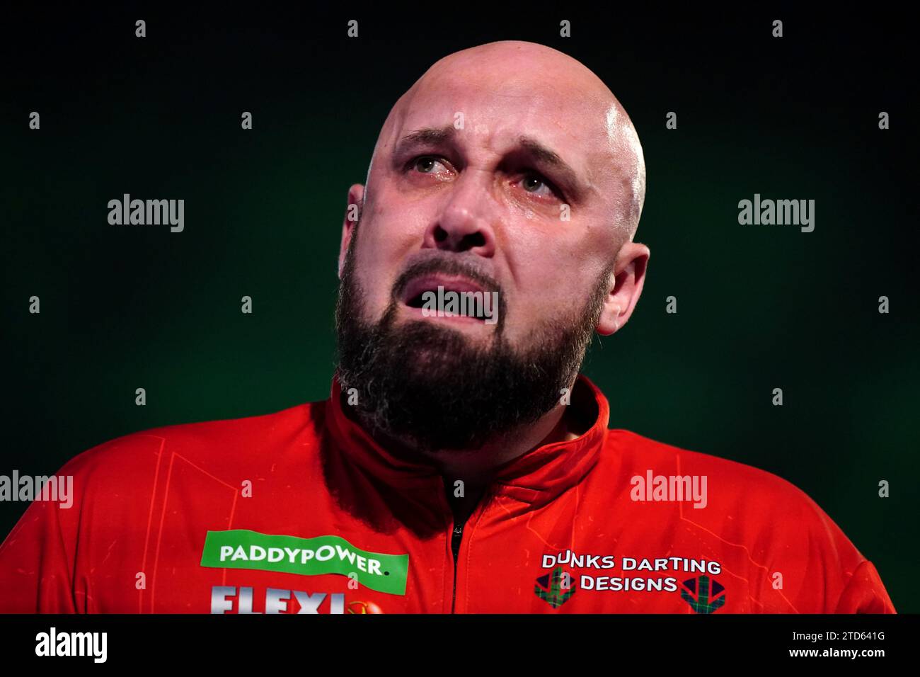 Jamie Hughes reacts after winning his match against David Cameron (not ...