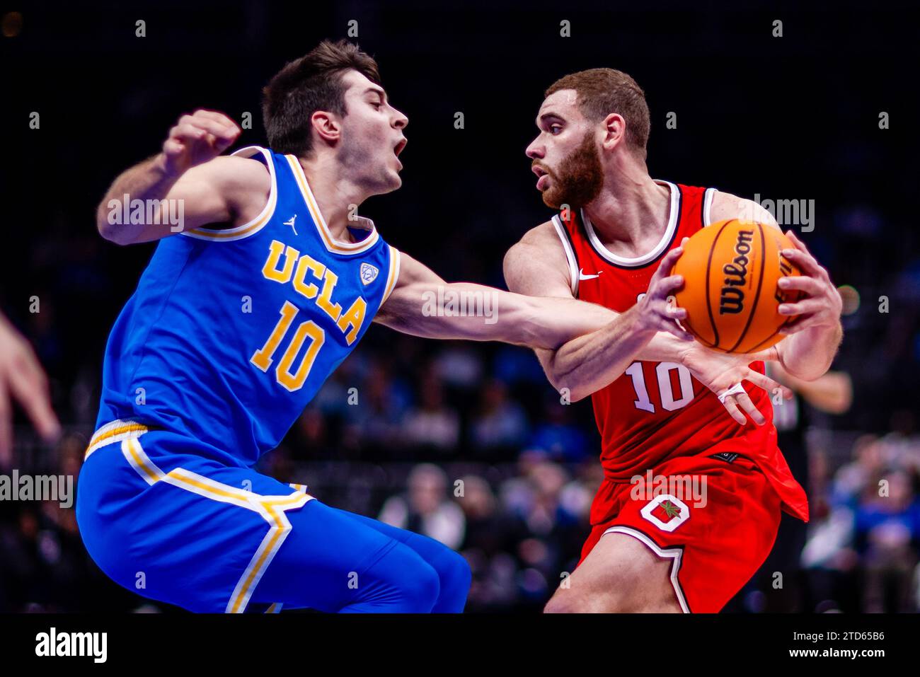 December 16, 2023: UCLA Bruins guard Lazar Stefanovic (10) fouls Ohio ...