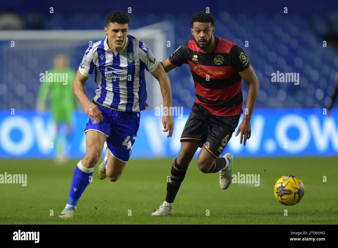 Bailey-Tye Cadamarteri #42 of Sheffield Wednesday runs past Jake Clarke ...