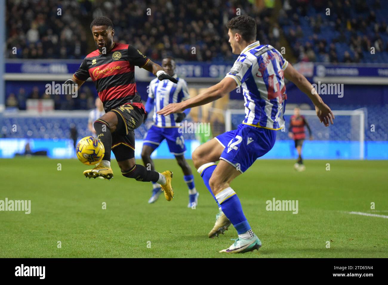 Kenneth Paal #22 of Queens Park Rangers tackles Bailey-Tye Cadamarteri ...
