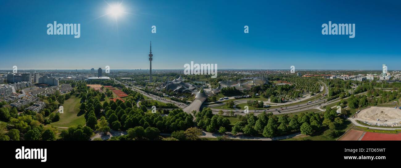 Sunny panoramic view of Munich's Olympic Park with sunshine Stock Photo ...