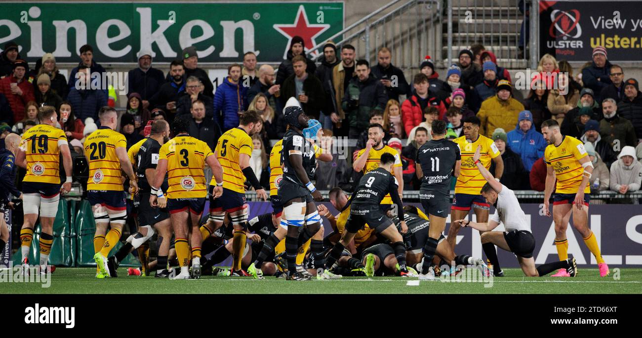Referee Luke Pearce (second from right) holds his hand in the air to ...