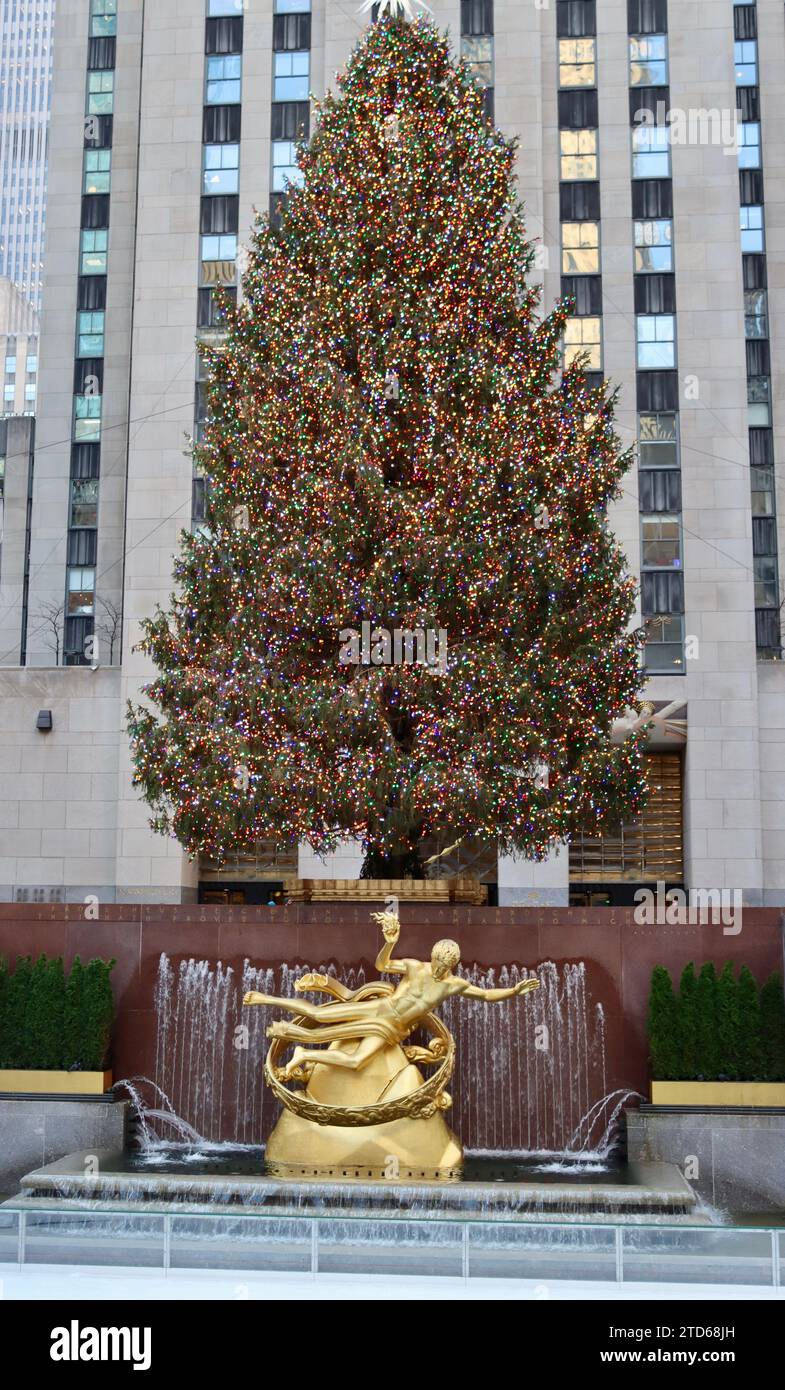 Prometheus gilded, cast bronze sculpture by Paul Manship in front of ...