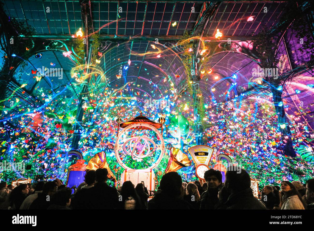 London, UK. 16th Dec, 2023. People watch the "The Butterfly Trail ...